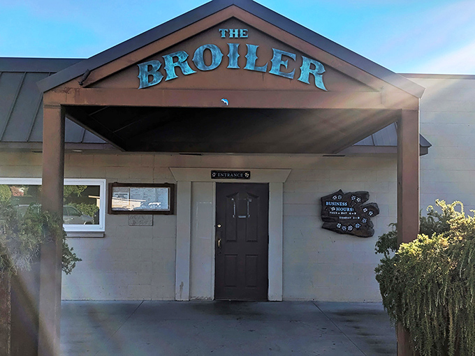 The unassuming entrance to The Broiler might make you drive right past, but that would be the culinary equivalent of missing the last exit before flavor paradise. 