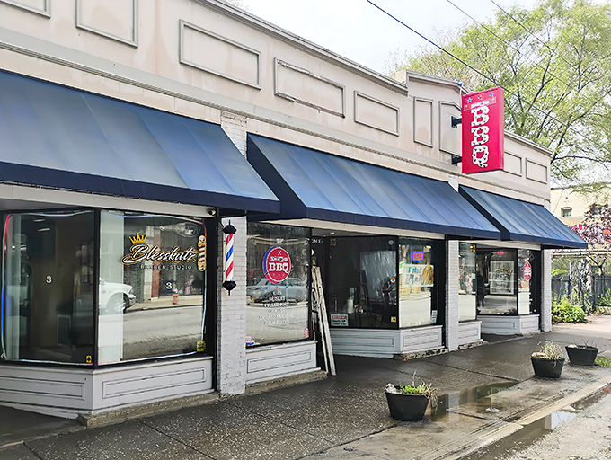 The unassuming storefront with blue awnings and a pop of red signage &ndash; Cleveland's best-kept barbecue secret hiding in plain sight on Lorain Avenue.