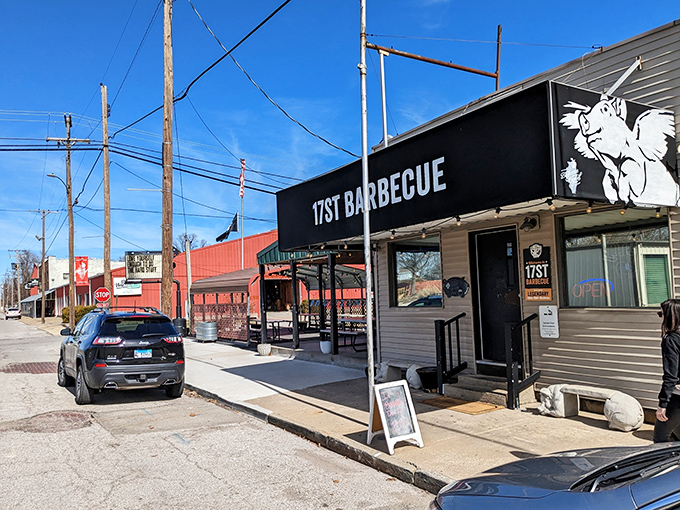 The unassuming exterior of 17th Street Barbecue proves once again that the best food often hides behind the simplest facades. That flying pig logo? A promise of smoky delights within.