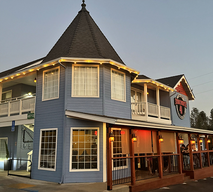 The blue beacon of barbecue bliss! Smokehouse 41's distinctive exterior promises smoky treasures within, like a delicious mirage in the Sierra foothills.