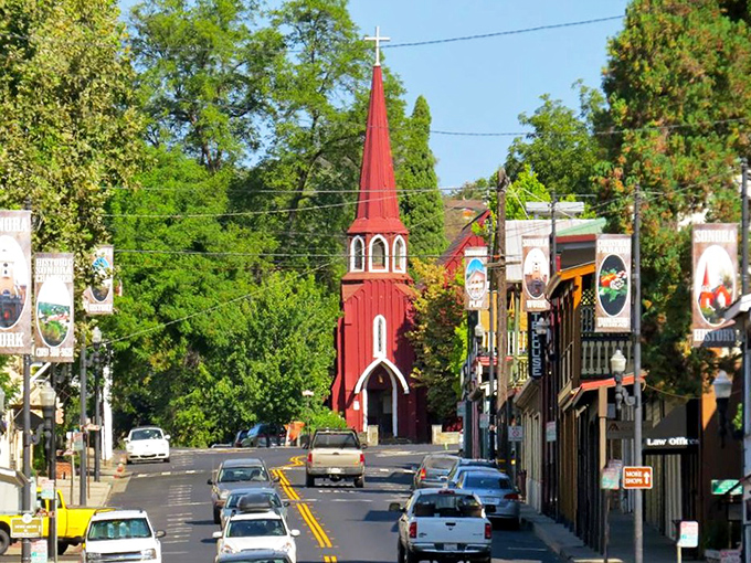 St. James Episcopal Church's vibrant red steeple stands like an exclamation point in Sonora's skyline, announcing "History lives here!" with architectural enthusiasm.