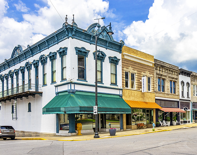 Historic storefronts line Carthage's square like architectural time travelers, their ornate facades whispering stories of bygone prosperity while sheltering modern businesses.