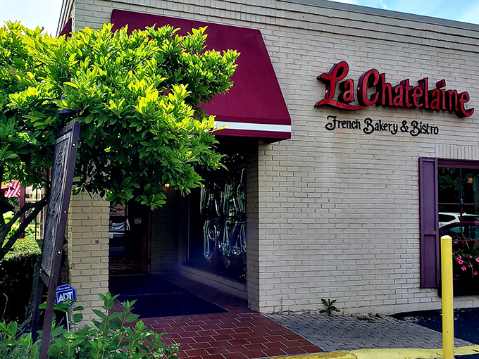 That iconic red signage against cream-colored stone isn't just curb appeal&mdash;it's a promise of Parisian delights hiding in plain sight in Columbus.