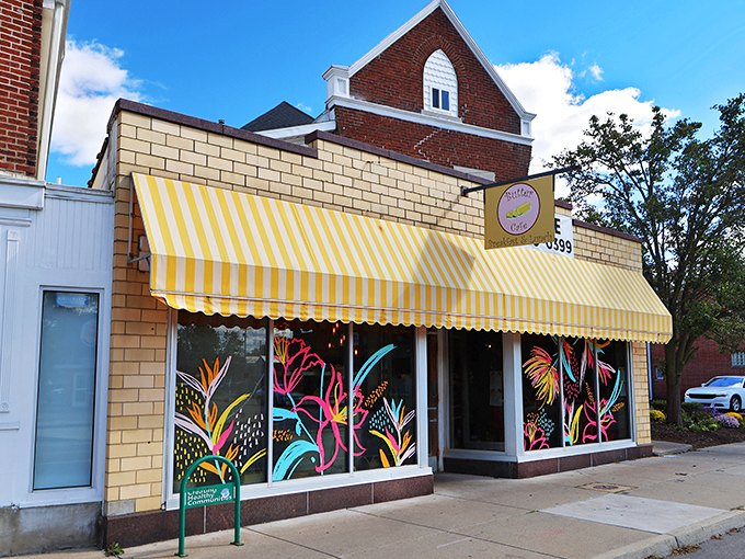 That cheerful yellow and white awning isn't just decoration—it's a breakfast beacon calling you home to Butter Cafe in Dayton.