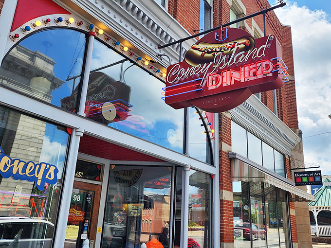 That iconic neon hot dog sign isn't just illuminating North Main Street&mdash;it's beckoning you toward breakfast nirvana in downtown Mansfield.