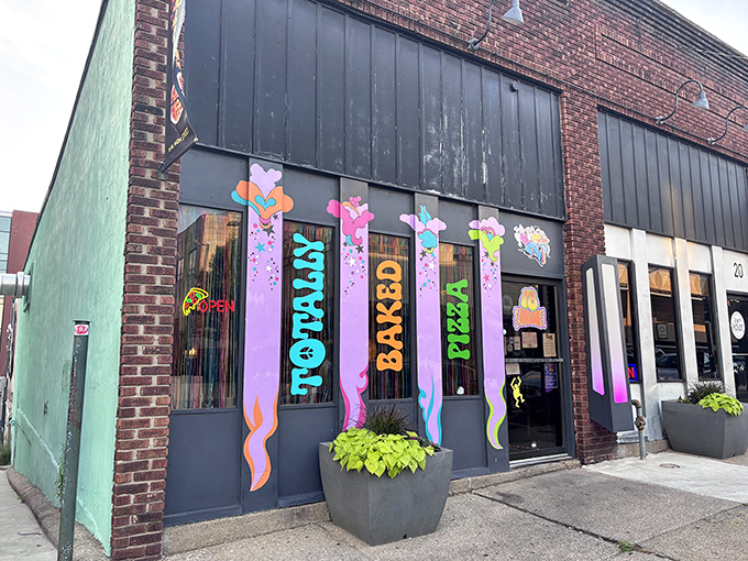 The psychedelic storefront of Totally Baked announces itself with vibrant colors that practically scream "this isn't your average pizza joint." Welcome to flavor wonderland.