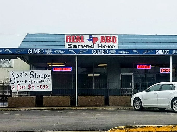 The blue awning with "GUMBO" repeated like a delicious mantra tells you everything you need to know about this Dallas treasure.