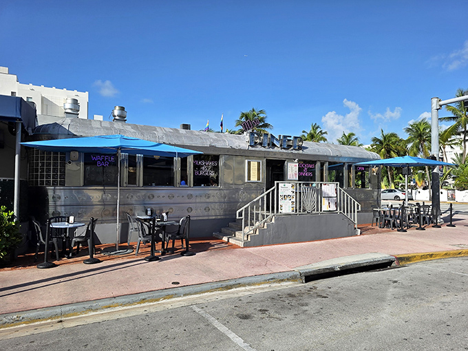 The gleaming stainless steel exterior of 11th Street Diner shines like a time machine that happens to serve excellent coffee and Cuban sandwiches.