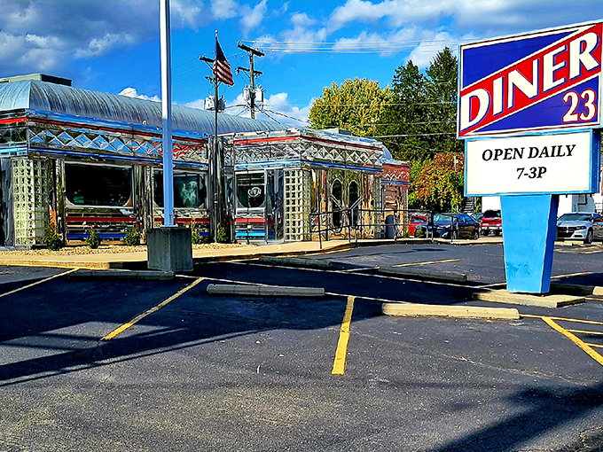 The gleaming stainless steel exterior of Maddy's Diner 23 shines like a beacon of hope for hungry travelers. This classic American diner promises nostalgic comfort in every bite.