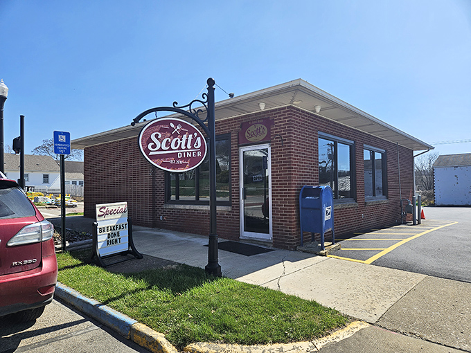 The brick exterior of Scott's Diner stands like a beacon of comfort food hope in New Concord, promising breakfast done right and memories in the making.