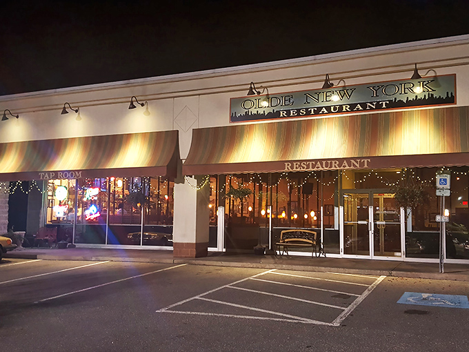 Olde New York's welcoming exterior glows with warm light and promise, like a beacon for hungry travelers in State College.