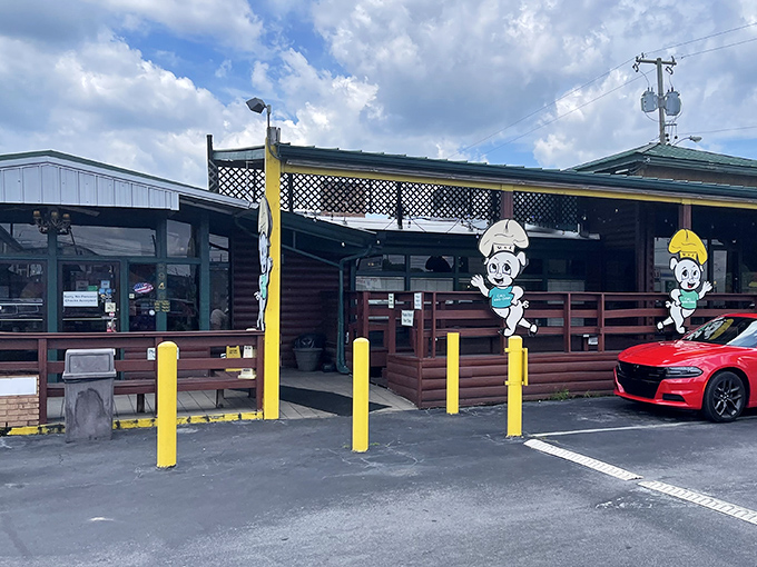 The unassuming exterior of Rib & Loin, where those cheerful cartoon pigs seem to be saying, "Come on in, the barbecue's fine!" Don't let the modest facade fool you.