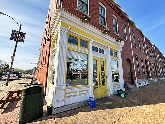 The bright yellow trim on this historic Soulard brick building isn't just cheerful—it's a beacon calling hungry pilgrims to the promised land of perfect barbecue.