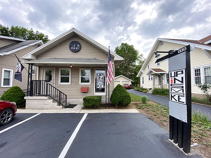 The longhorn logo above this unassuming tan house is like a smoke signal to barbecue lovers &ndash; something magical is happening inside Up In Smoke BBQ. 