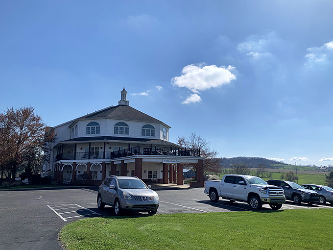 The stately white exterior of Amish Door Restaurant stands like a culinary lighthouse, beckoning hungry travelers across Ohio's rolling countryside.