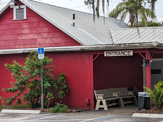 The iconic coffee cup sign stands tall against the Florida sky, beckoning hungry travelers to this unassuming red building that promises comfort food paradise.