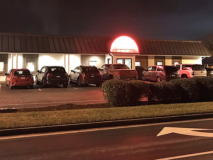 The unassuming entrance to George's Steak House stands like a culinary speakeasy &ndash; no flashy signs needed when your reputation travels by word of mouth.