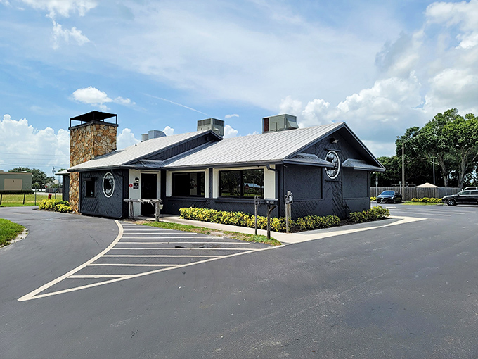 The unassuming exterior of Moonswiners Bar-B-Q stands like a smoke signal to hungry travelers&mdash;proof that the best BBQ joints often hide in plain sight.