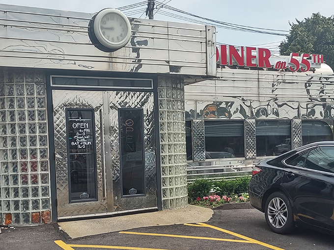 That gleaming stainless steel exterior isn't just a facade&mdash;it's a time machine disguised as a diner. Classic glass blocks and neon signage promise authentic nostalgia inside.