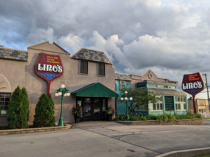 The stucco facade of Lino's glows at sunset like a Mediterranean mirage in the Midwest, complete with vintage signage that's been guiding hungry travelers for generations.