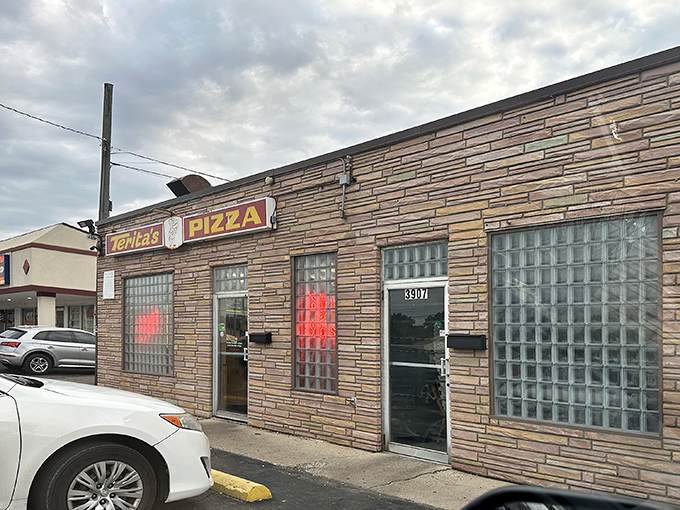 The unassuming stone facade of Terita's Pizza hides Columbus's best-kept secret. Like finding a Picasso at a yard sale, this place is pure culinary treasure.