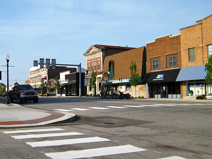 Downtown Nappanee's historic brick facades stand as living witnesses to a century of small-town American life, their warm tones glowing in the Indiana sunshine.