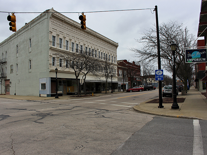 Conneaut's downtown architecture tells stories in brick and mortar. That vibrant yellow building stands like a cheerful sentinel guarding small-town memories. 