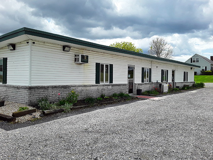 The unassuming white exterior of The Apple Bin might not scream "culinary destination," but that's exactly how hidden gems work their magic.