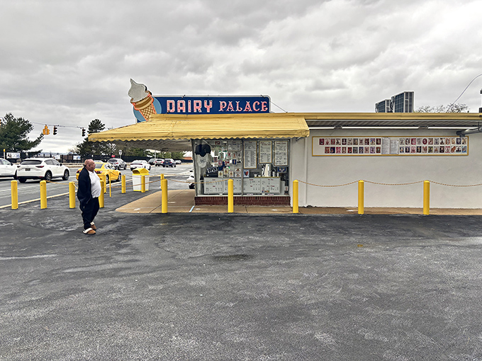 The iconic Dairy Palace stands like a beacon of frozen happiness, its yellow awning and ice cream cone sign promising sweet relief from everyday life.