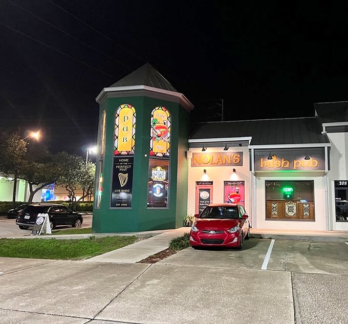 The emerald beacon of Nolan's Irish Pub glows against the Florida night, a Celtic oasis where astronauts and beach-goers alike find common ground over perfect pints.