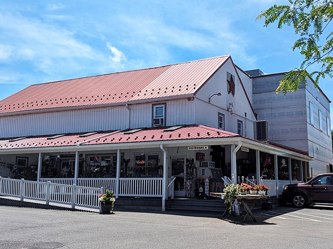The unassuming white building with its red roof might not look like food paradise, but locals know this humble exterior hides culinary treasures within.