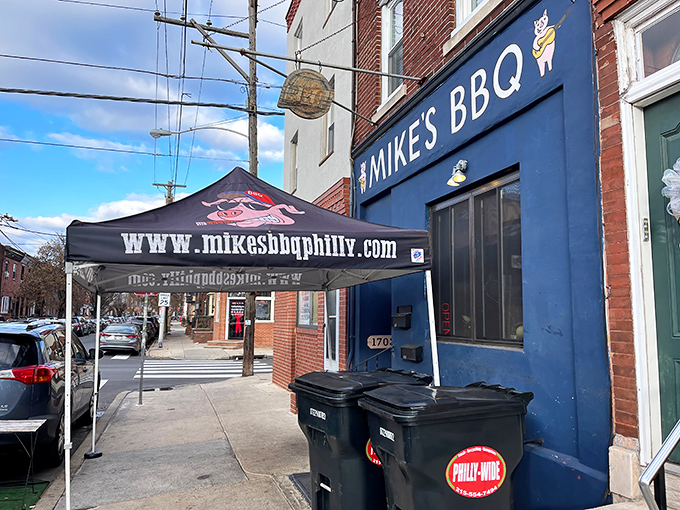 The bright blue storefront of Mike's BBQ stands out on 11th Street like a smoke signal to hungry Philadelphians seeking barbecue nirvana.