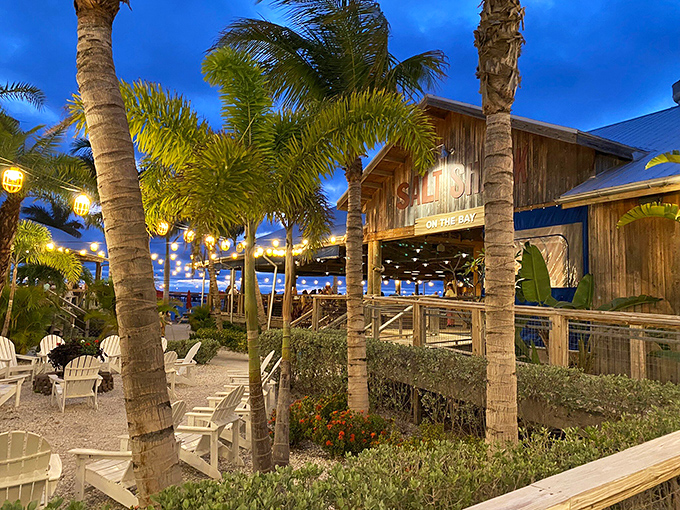 Paradise found! Salt Shack's weathered wood exterior and white Adirondack chairs create the perfect "I'm officially on vacation" vibe, even for locals.