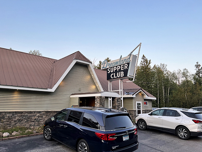 The classic supper club exterior beckons with its vintage sign and stone columns&mdash;motorcycles out front always a good sign that locals know something you don't.