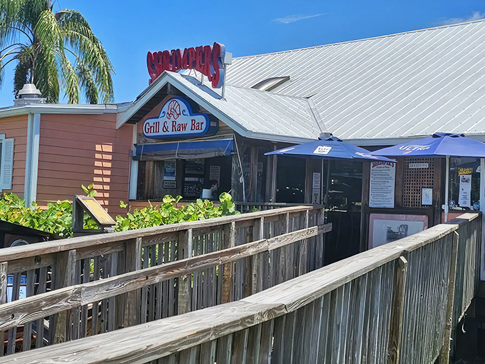 Shrimpers' cheerful yellow exterior welcomes you like an old friend, with palm trees swaying as if to say "come on in, the seafood's fine!"