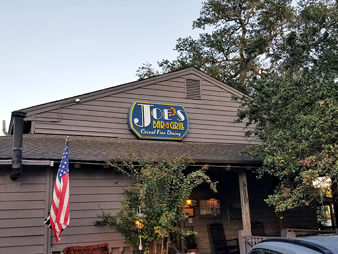 Tucked beneath Spanish moss and live oaks, Joe's Bar & Grill's unassuming exterior hides culinary treasures that locals have cherished for years.