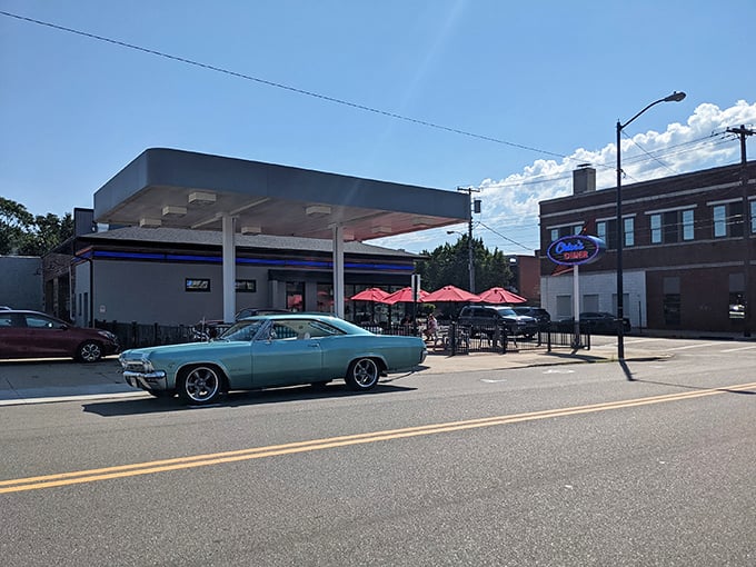 The classic gas station canopy now shelters hungry diners instead of fuel pumps &ndash; a transformation that would make Route 66 enthusiasts weep with joy.
