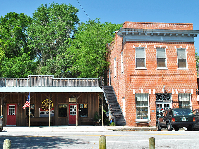 Brick storefronts with palm trees standing guard &ndash; Micanopy's main street feels like stepping into a time capsule where Florida's past lives comfortably in the present.
