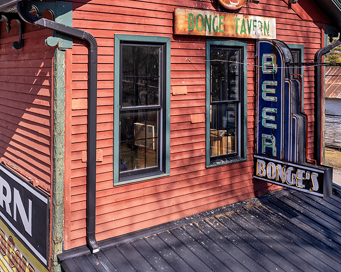 The iconic coral-colored exterior of Bonge's Tavern stands like a culinary lighthouse in rural Indiana, beckoning hungry travelers with its vintage charm and legendary reputation.