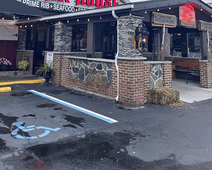 The rustic stone and brick exterior promises old-school charm before you even step inside. That hay bale isn't just for show&mdash;it's a preview of the no-nonsense authenticity awaiting within.