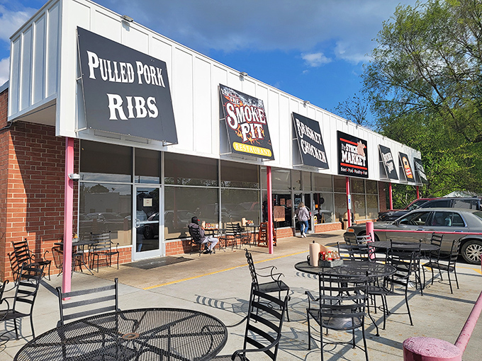 Strip mall exterior that houses barbecue gold &ndash; sometimes the best treasures hide in plain sight.