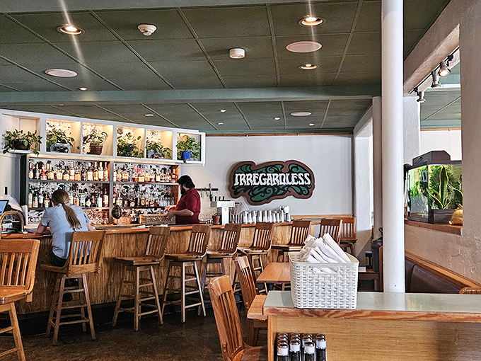The iconic green sign beckons like an old friend, promising "Live Music Nightly" and the kind of meal that makes grammar rules seem utterly unimportant.
