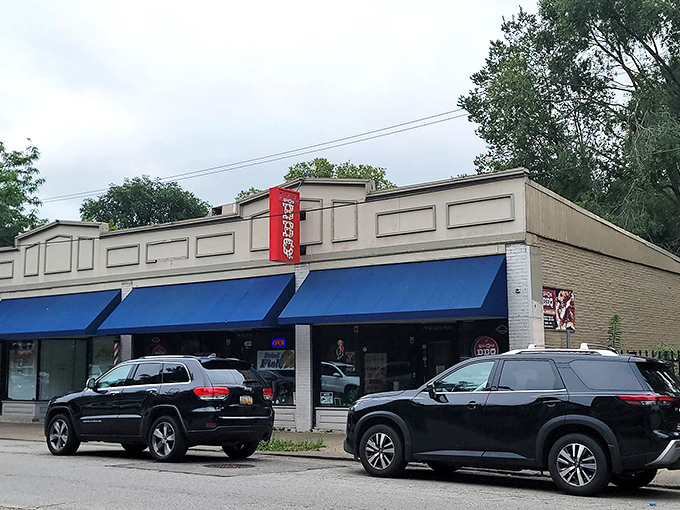 The unassuming storefront with blue awnings might not scream "food paradise," but locals know better&mdash;culinary treasures often hide in plain sight.