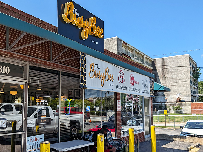 The iconic Busy Bee sign beckons hungry souls like a golden lighthouse in a sea of Atlanta hunger. Soul food salvation awaits inside. 