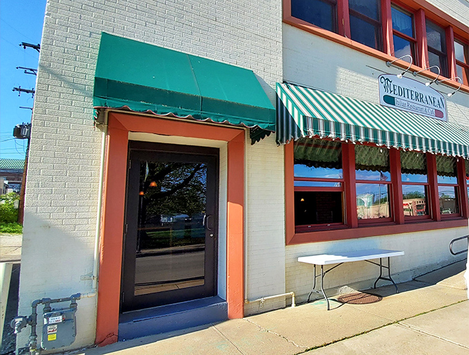 The unassuming storefront of Mediterranean Restaurant in Wilmington might not scream "culinary destination," but that green awning signals delicious treasures await inside.