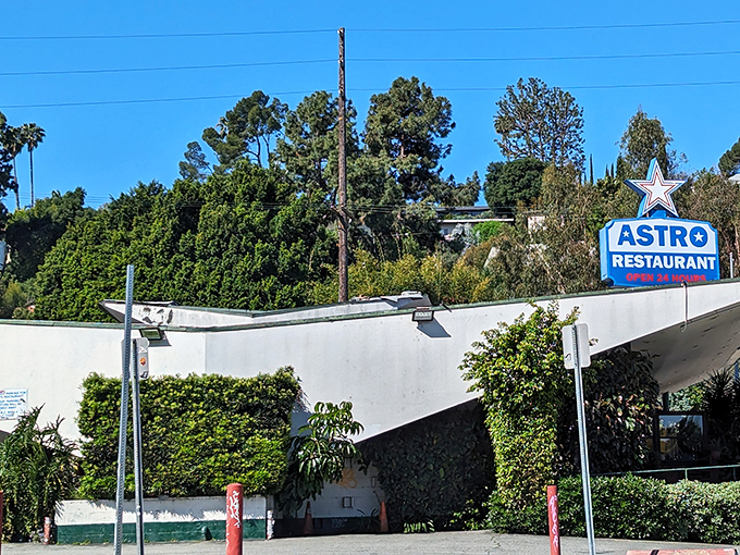 The unmistakable Googie architecture of Astro Family Restaurant stands like a mid-century spaceship that landed in Silver Lake and decided to serve breakfast instead.