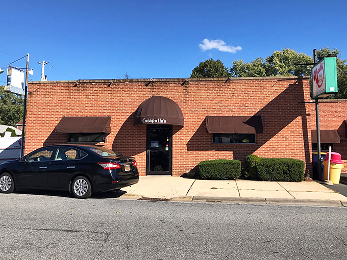 That classic brick facade and vintage signage whisper promises of sandwich perfection waiting inside.