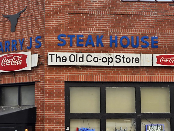 That unassuming brick facade hides culinary treasures that would make city steakhouses weep with envy.