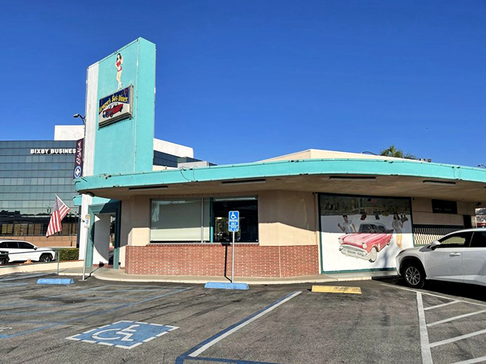 That turquoise tower isn't just eye-catching&mdash;it's a time machine disguised as architecture. Classic cars and classic meals await inside this Long Beach landmark.
