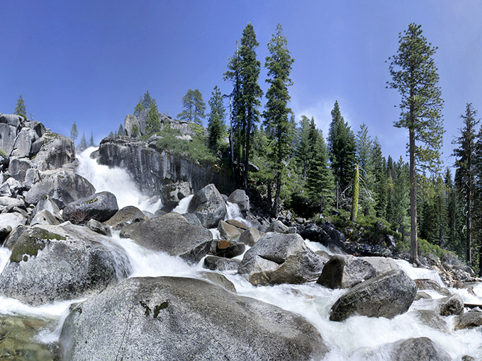 Nature's masterpiece in full force! Bassi Falls thunders down granite steps, creating a symphony of sound and spray that makes smartphones suddenly seem very unimportant.